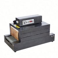 China Hot Sale Small Plastic Film Heat Tunnel Shrink Cutting Packaging Machine for Bottle/box Easy Operate for sale