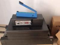 China Hot Sale Small Plastic Film Heat Tunnel Shrink Cutting Packaging Machine for Bottle/box Easy Operate for sale