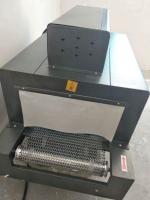 China Hot Sale Small Plastic Film Heat Tunnel Shrink Cutting Packaging Machine for Bottle/box Easy Operate for sale