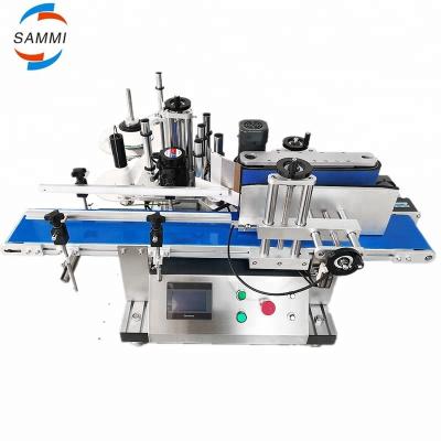 China Factory Semi Automatic Adhesive Sticker Wine Labeling Machine for Round Glass Bottle Price for sale
