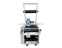 China MT-50 Semi-automatic Round Bottle Labeler, Labeling Machine for Cans and Beverage Bottles for sale