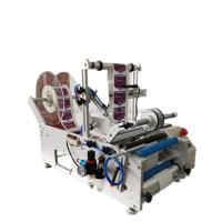 China Semi Automatic 10ml Glass Bottle Single/Double Side Sticker Label Round Bottle Labeling Machine for sale