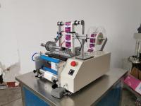 China Semi Automatic 10ml Glass Bottle Single/Double Side Sticker Label Round Bottle Labeling Machine for sale