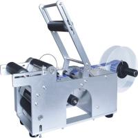 China MT-50 Semi-Automatic Adhesive Sticker Labeling Machine for Round Bottles Jars for Metal Paper Glass Packaging Food Use-New Used for sale