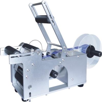 China MT-50 Semi-Automatic Adhesive Sticker Labeling Machine for Round Bottles Jars for Metal Paper Glass Packaging Food Use-New Used for sale