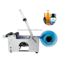 China Semi-Automatic Manual PET Glass Plastic Water Bottle Wine Tin Cans Label Applicator New Condition Labeling Machine for Cosmetics for sale