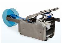 China Labeling Machinery Sticker Machines Simple Manual Handy Round Bottle Labeling Machine, Manual Labeler for sale