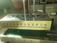 China Automatic Aluminum Foil Sealing Machine for Bottles for sale