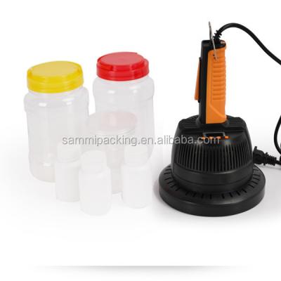 China Hand Held Electromagnetic Induction Capping Machine Plastic Bottle Cap Sealer Capper Aluminium Foil Sealing Machine for sale
