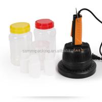 China Hand Held Electromagnetic Induction Capping Machine Plastic Bottle Cap Sealer Capper Aluminium Foil Sealing Machine for sale