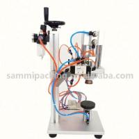 China Low Price Compact Manual Handheld Perfume Bottle Cap Sealing Machine for sale