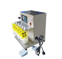 China Semi-Automatic 100Ml 300Ml 500Ml Spout Pouch Doypack Electric Liquid Filling Machine for Beverages for Hot Coconut Water Tea Oil for sale