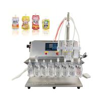 China Semi Automatic Four Head Slide Nozzles Liquid Water Spout Pouch Bag Filling Machine Nozzle Bag Filler and Sealer for sale