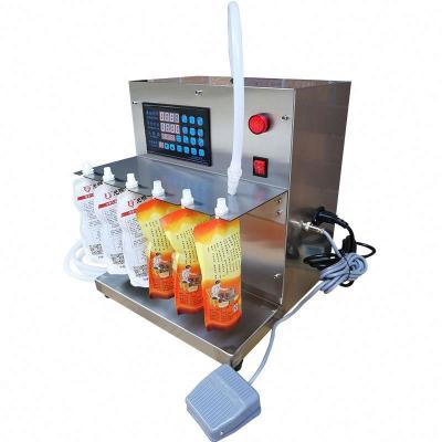 China Semi-Automatic Stand-Up Sealing Packaging Machine for Juice Liquid Spout Pouch Filling Accuracy 1ml for Oil for sale