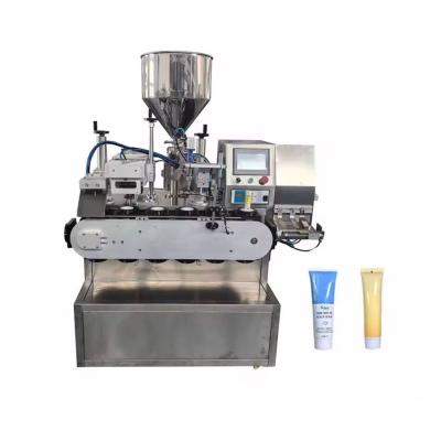 China Automatic Cosmetic Cream Tube Filling and Sealing Machine Ultrasonic Soft Tube Filling and Sealing Machine for sale