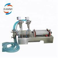 China 100-1000ml Semi Automatic Double Filling Heads Volumetric Piston Liquid Dosing Machine for sale