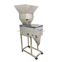 China High Quality 100-3000g Semi Automatic Granule/Powder/Rice/Coffee/Spice Weighing Filling Machine with Big Funnel for sale