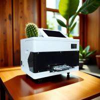China Compact Desktop UV Printer with Multi-Material Printing and 10.1-inch Touch Screen for Professional Digital Printing for sale