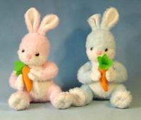 China 25cm Stuffed Easter Bunnies with Egg Push Toys Soft Plush Toys for Holiday Celebration for sale
