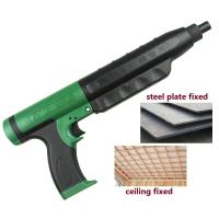 China Silent Black Green Powder Nail Gun with 2.2kg Capacity and Noise Reduction Feature for sale