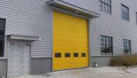 China Automatic Insulated Sectional Doors sandwich Industrial Factory Door Customized for sale
