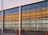 China Transparent Aluminum Industrial Sectional Doors For Fire Protection Exhibition Halls for sale