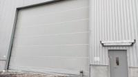 China Operating Temperature Range Minus 30 Degrees Celsius To Plus 60 Degrees Celsius Vertical Lift Fabric Doors With Obstacle Detection Emergency Stop And Maximum Height 12 Meters for sale
