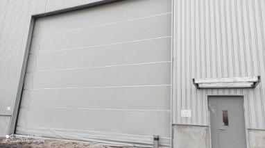 China Operating Temperature Range Minus 30 Degrees Celsius To Plus 60 Degrees Celsius Vertical Lift Fabric Doors With Obstacle Detection Emergency Stop And Maximum Height 12 Meters for sale