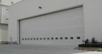 China strength Industrial Fabric Vertical Lift Fabric Doors Featuring Maximumheight 12 Meters and Windresistance Up To 120 Kmh Ideal for Warehouses for sale