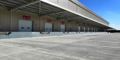 China Wind Resistance 450N/m2 Industrial Sectional Doors Garage Insulated Steel Doors for sale