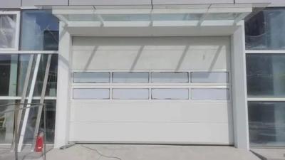 China Industrial Sectional Door with AC 220V-240V Motor Remote Control and Enhanced Security Features for sale