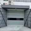China 220380V Motor Voltage High Velocity Spiral Door Integrated with Photoelectric Sensor Safety System Supporting Automation for sale