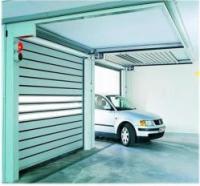 China 40mm Thickness Industrial Sectional Door with AC 220V-240V Motor and 24dB Acoustic Insulation for sale