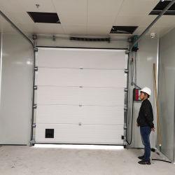 China 40mm Thickness Wind-Resistant Heat-Insulating Industrial Sectional Overhead Insulated Door for Workshops for sale