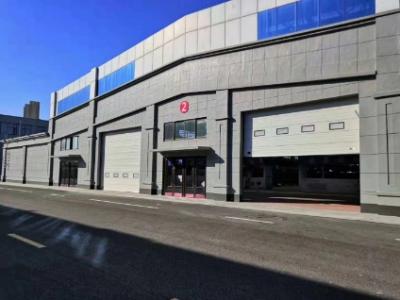 China Automatic Industrial Sectional Door with 40mm Thickness AC 220V-240V Motor and 24dB Acoustic Insulation for sale