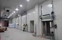 China 40mm Thickness Industrial Sectional Door with AC 220V-240V Motor and 24dB Acoustic Insulation for sale