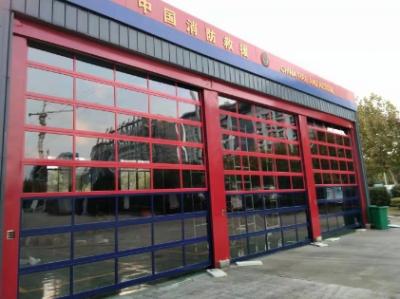 China Customizable 40mm Thickness Wind-Resistant Industrial Sectional Door with Remote Control for sale