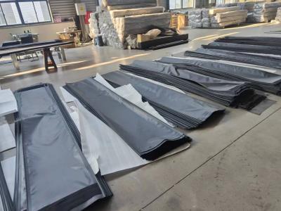 China Wood Grain Surface Finishes Industrial Garage Doors Offering Performance Across Diverse Operating Temperature Environments for sale