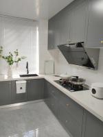 China Customized Free Design PVC Glossy Kitchen Cabinet For Apartment Villa for sale