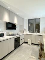 China High End Melamine Kitchen Cabinet With Island Custom Cabinets for sale