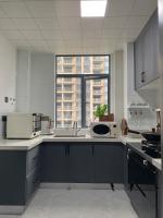 China Laminated Melamine Finish Vertical Wood Grain Frameless Kitchen Cabinet For Home for sale