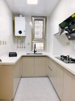 China Laminated Melamine Finish Vertical Wood Grain Frameless Kitchen Cabinet For Home for sale