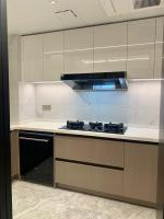 China Modern Design Melamine Finish With Quartz Stone Waterfall Island Kitchen Cabinet for sale