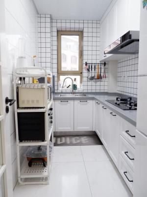 China Modern Design Melamine Finish With Quartz Stone Waterfall Island Kitchen Cabinet for sale