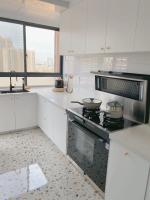 China Walnut Woodgrain Anti-Fingerprint Eco-Certified Particle Board Kitchen Cabinet for sale