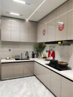 China Three Section Track Linear Style Wood Kitchen Cabinet Wooden Cupboard for sale