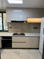 China Custom Modern Kitchen Cabinet with Anti-Fingerprint Pet Film for sale