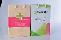 China Recycle Biodegradable Gift Bags Pharmacy Paper Bags full color printing for sale