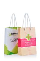 China Recycle Biodegradable Gift Bags Pharmacy Paper Bags full color printing for sale
