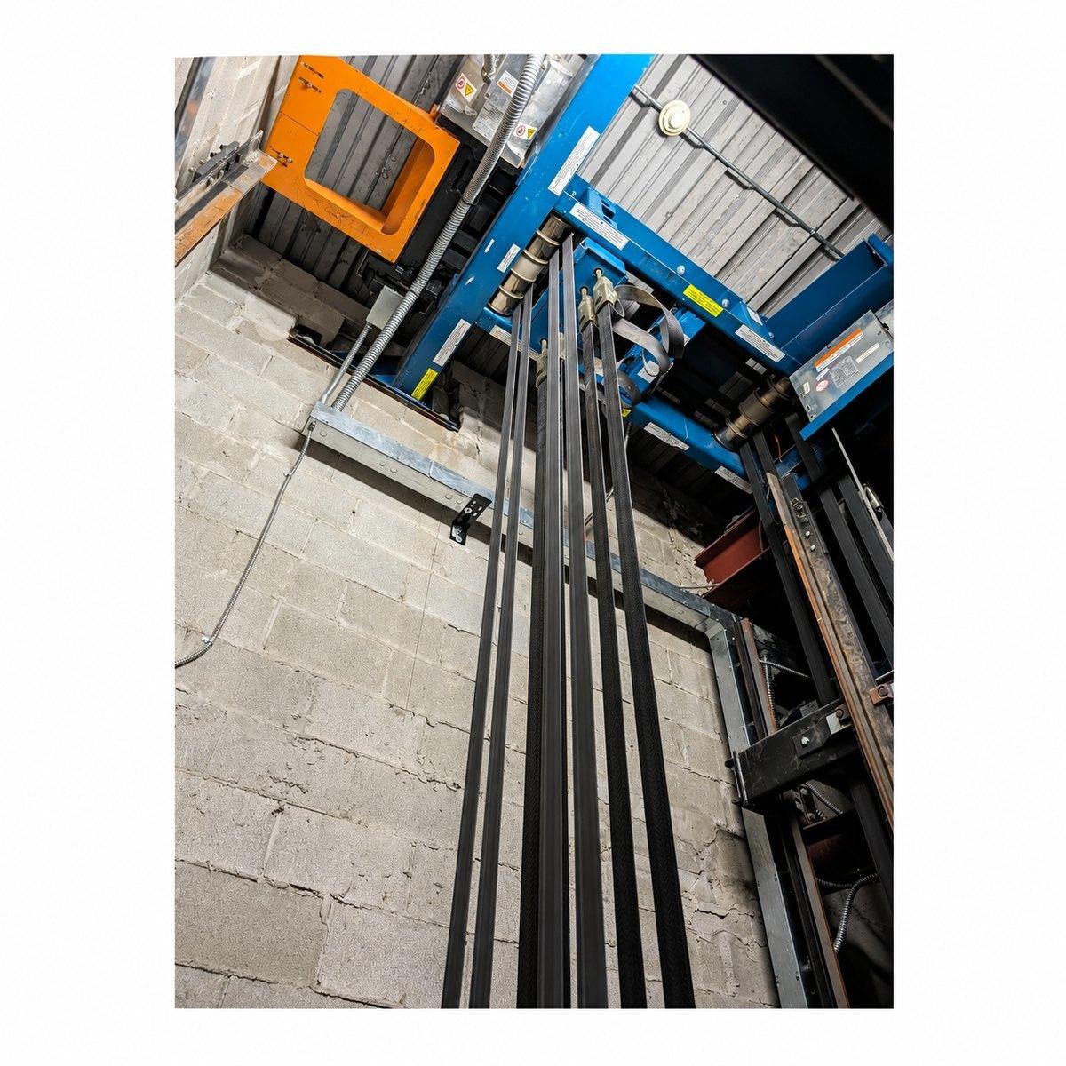 Coated steel belt used in an elevator suspension system